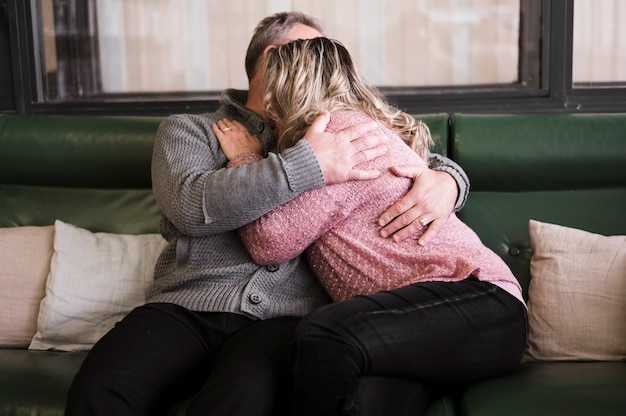 Free Photo Lovely Senior Couple Hugging Indoors