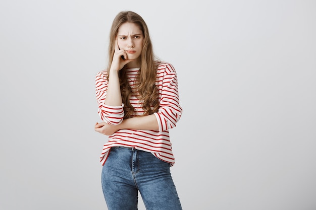 Free Photo Mad Pouting Teenage Girl Frowning And Looking Away Upset