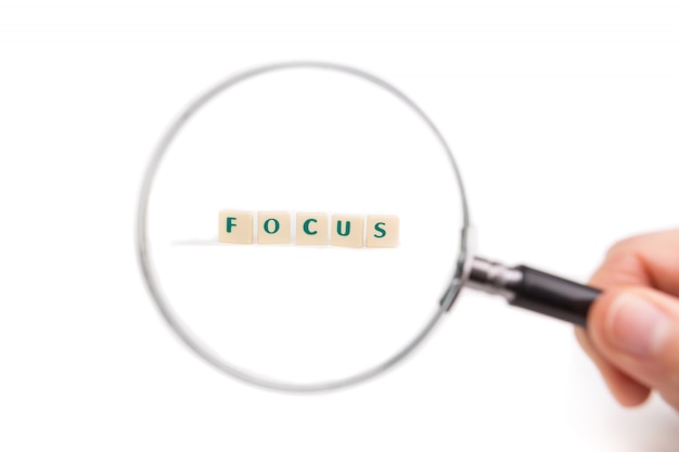 Premium Photo | Magnifying glass on focus letters Premium Photo | Magnifying glass on focus letters
