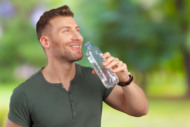 Premium Photo | Man holding water bottle Premium Photo | Man holding water bottle
