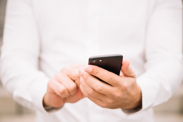 Free Photo | Man in shirt browsing on phone Free Photo | Man in shirt browsing on phone