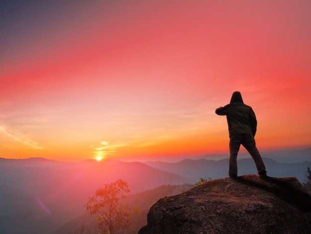 Premium Photo | A man standing in front of beautuful sunset Premium Photo | A man standing in front of beautuful sunset