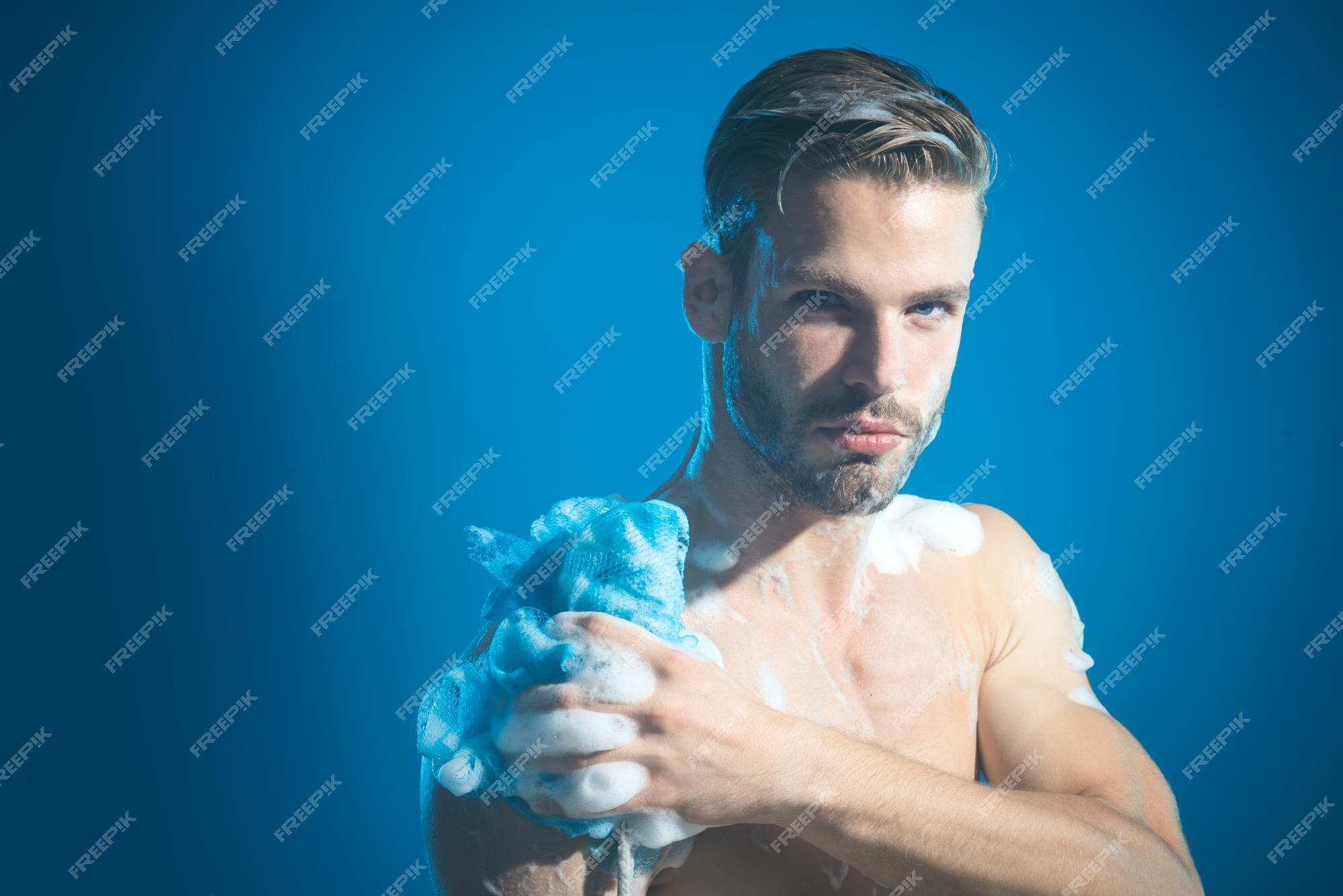 Premium Photo Man Taking Shower With Soap Sponge Muscular Bearded
