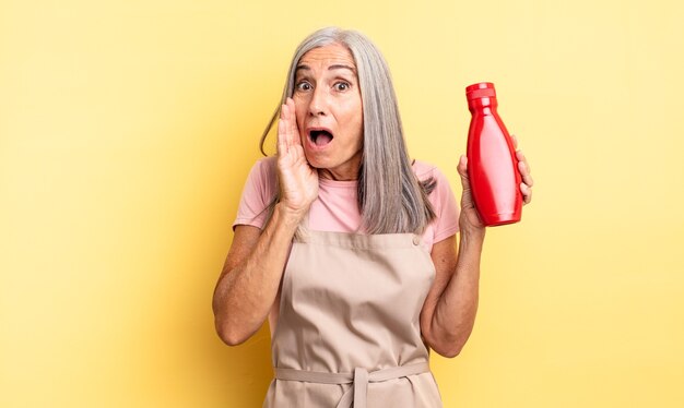 Premium Photo Middle Age Pretty Woman Feeling Shocked And Scared Ketchup Concept