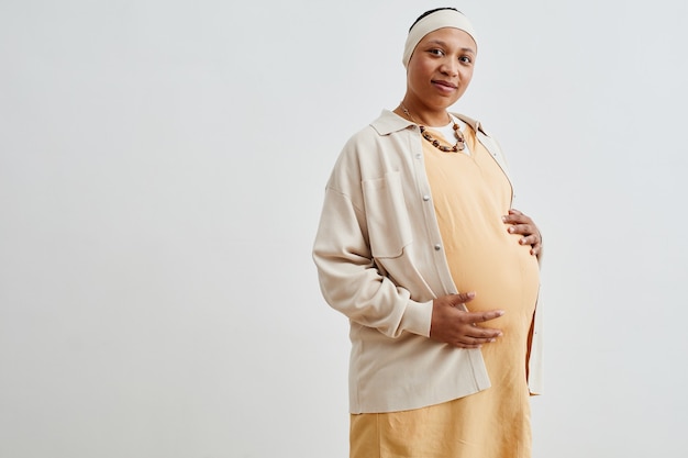Premium Photo Minimal Portrait Of Pregnant African American Woman