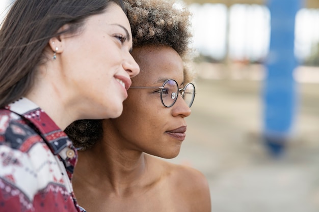 Premium Photo Multi Ethnic Lesbian Women United Staring At The Horizon