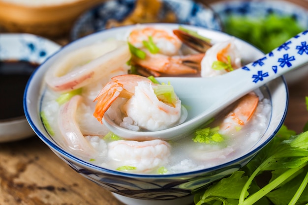 Nutritious and delicious seafood porridge | Premium Photo Nutritious and delicious seafood porridge | Premium Photo