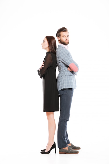 Free Photo | Offended loving couple standing isolated Free Photo | Offended loving couple standing isolated