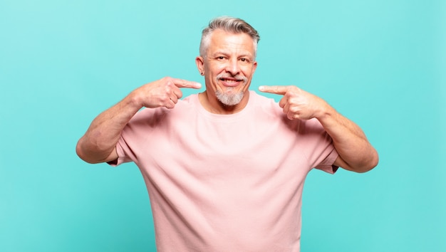 Premium Photo Old Senior Man Smiling Confidently Pointing To Own