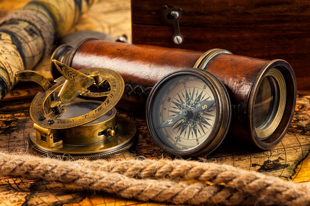 Premium Photo | Old vintage compass and navigation instruments on ... Premium Photo | Old vintage compass and navigation instruments on ...