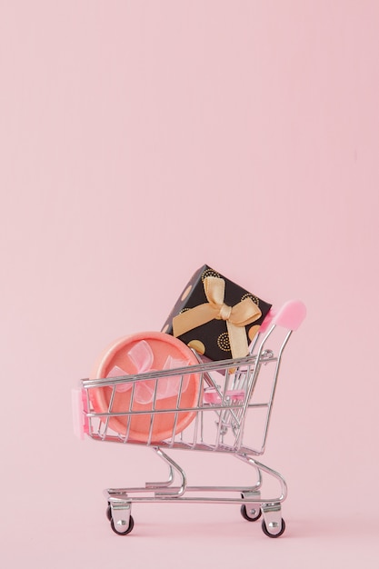 Premium Photo | Online shopping concept, shopping cart with gift boxes Premium Photo | Online shopping concept, shopping cart with gift boxes