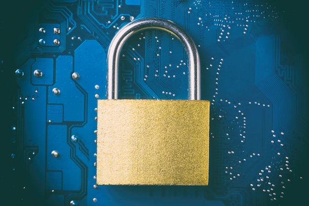 Premium Photo | Padlock on computer motherboard Premium Photo | Padlock on computer motherboard
