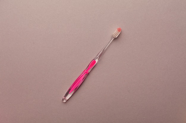 Premium Photo Pink Toothbrush
