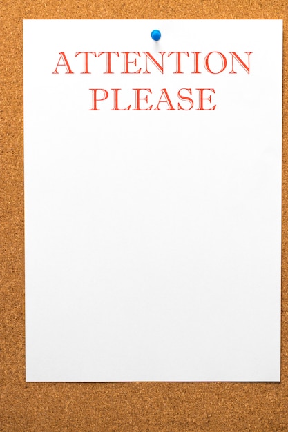Premium Photo | Please attention written on note paper. board cork Premium Photo | Please attention written on note paper. board cork