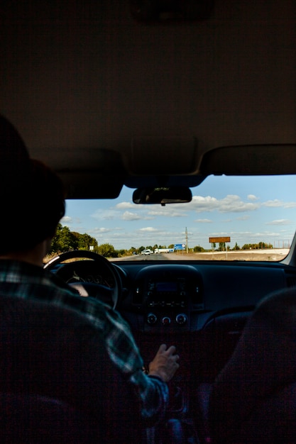 Free Photo | Poorly lit perspective man driving a car Free Photo | Poorly lit perspective man driving a car
