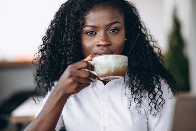 Free Photo Portrait Of A Beautiful African American Woman Drinking Coffee