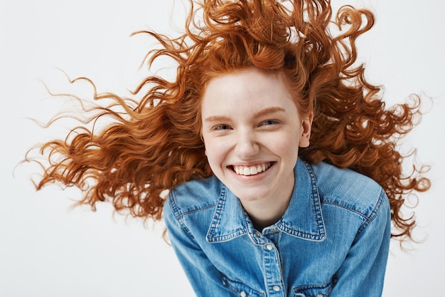 Free Photo Portrait Of Beautiful Cheerful Redhead Woman With Flying