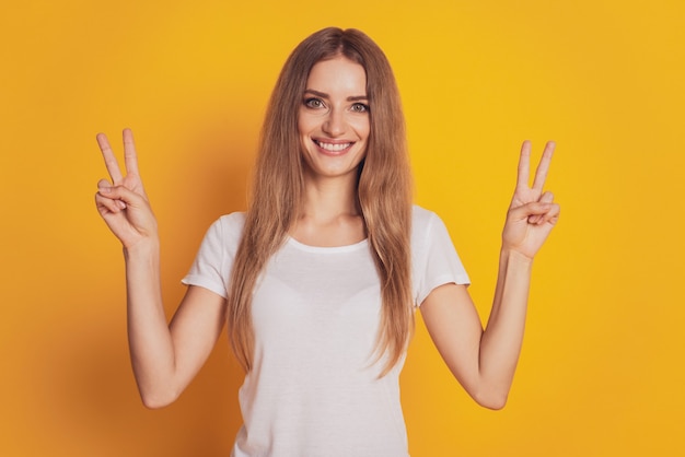 Premium Photo Portrait Of Cute Woman Showing V Sign Isolated On