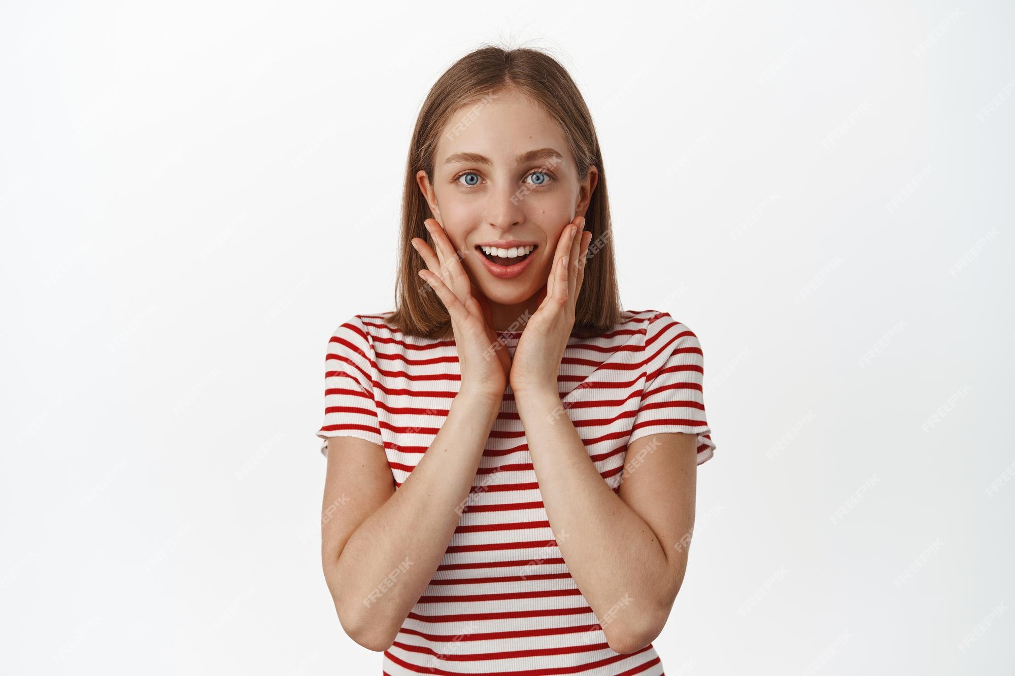 Premium Photo Portrait Of Delighted Smiling Blond Girl Feel Flattered