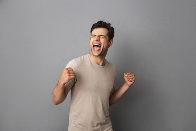 Premium Photo | Portrait of an excited young man Premium Photo | Portrait of an excited young man