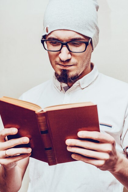 Premium Photo Portrait Of Handsome Bearded Man Reading A Book