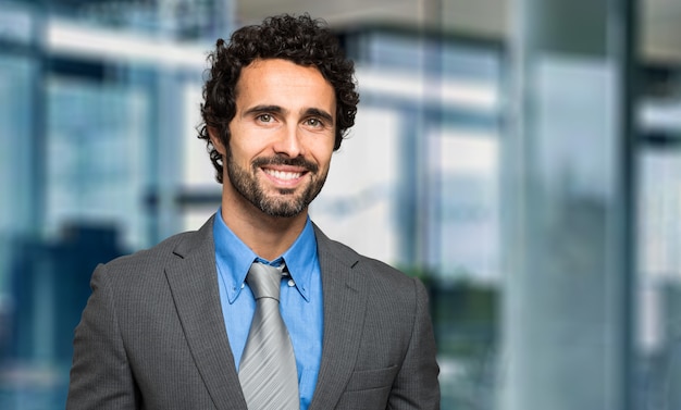Premium Photo | Portrait of an handsome businessman Premium Photo | Portrait of an handsome businessman