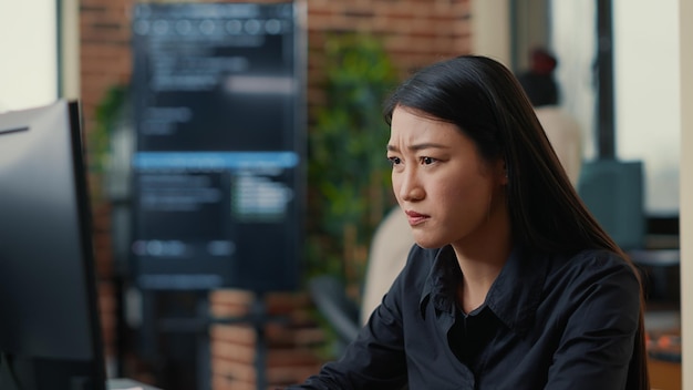 Premium Photo Portrait Of Infuriated Software Developer Focused On Writing Code After