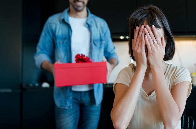 Premium Photo Portrait Of Young Man Surprising His Girlfriend With A