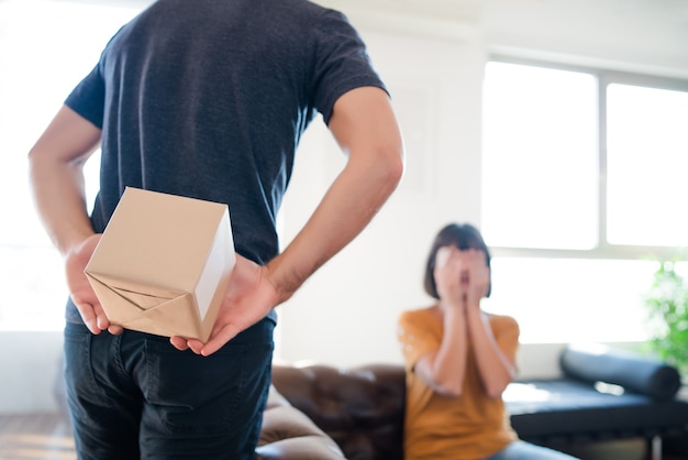 Premium Photo Portrait Of Young Man Surprising His Girlfriend With A