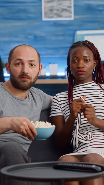 Premium Photo Pov Of Married Interracial Couple Watching Scary Movie Together On Couch Multi