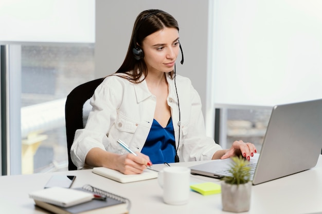 Premium Photo Pregnant Woman Sitting At Her Office