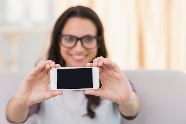 Premium Photo Pretty Brunette Taking A Selfie On Couch