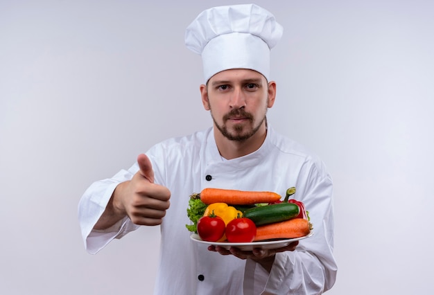 Free Photo | Professional male chef cook in white uniform and cook hat ... Free Photo | Professional male chef cook in white uniform and cook hat ...