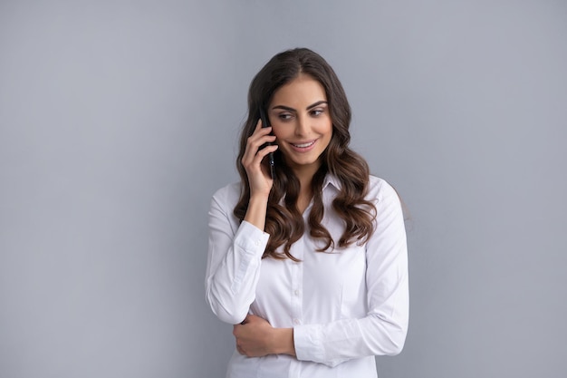 Premium Photo Professional Woman Manager Talk On Mobile Phone Grey