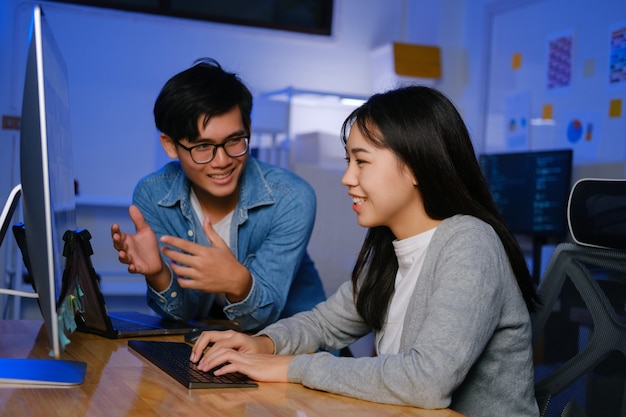 Premium Photo | Programmer and developer teamwork working in a software ...