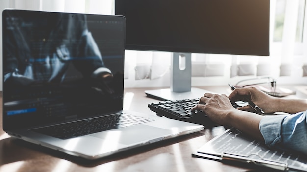 Premium Photo | Programmer working in a software development and coding technologies. website ...