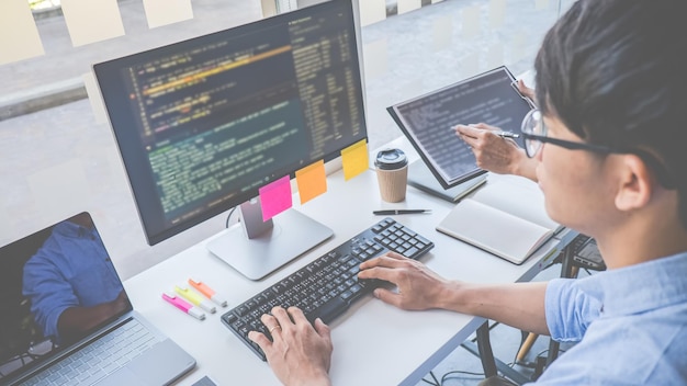 Premium Photo | Programmer working in a software development and coding technologies website ...