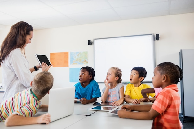 Premium Photo | Pupils listening the teacher Premium Photo | Pupils listening the teacher