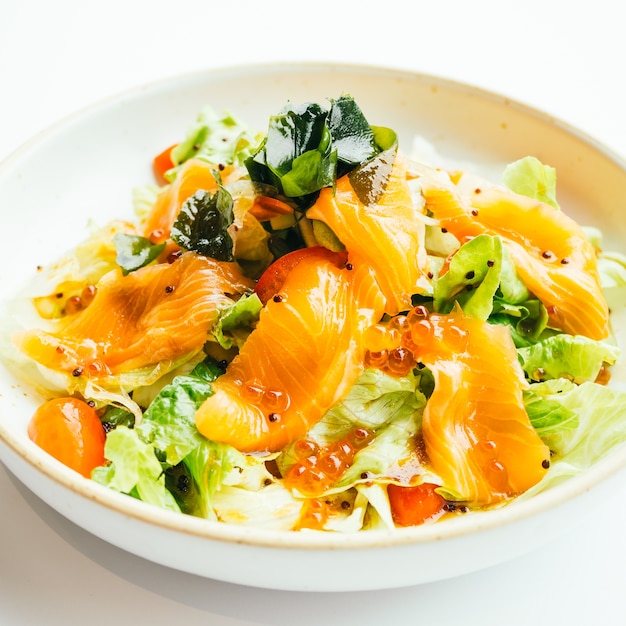 Free Photo | Raw fresh salmon meat sashimi with vegetable salad Free Photo | Raw fresh salmon meat sashimi with vegetable salad