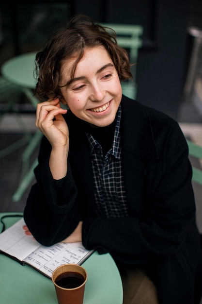 Free Photo | Retro looking non binary person smiling Free Photo | Retro looking non binary person smiling