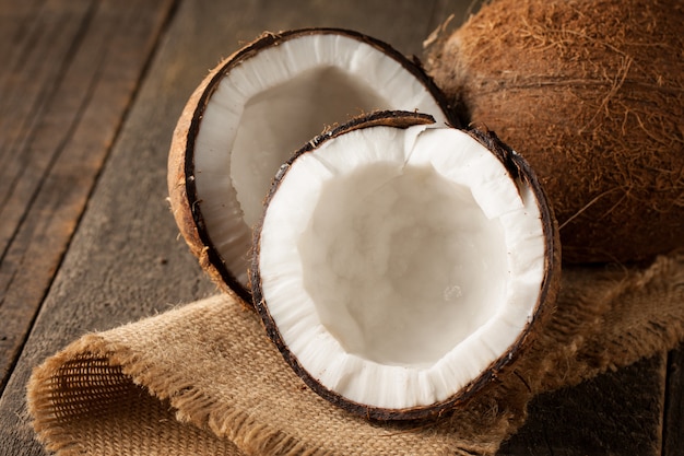 Premium Photo | Ripe half cut coconut Premium Photo | Ripe half cut coconut