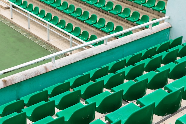 Premium Photo | Rows of green diagonal empty spectator seats Premium Photo | Rows of green diagonal empty spectator seats