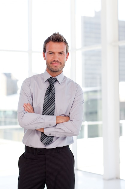 Premium Photo | Serious businessman with folded arms Premium Photo | Serious businessman with folded arms