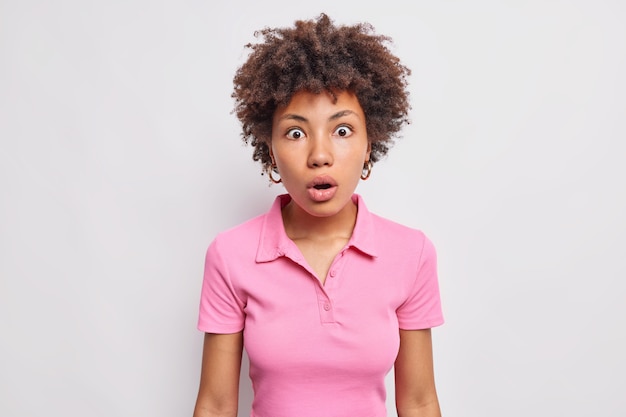 Free Photo Shocked Curly Haired Young Woman With Afro Hair Stares