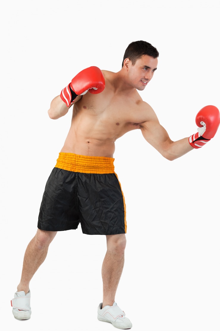 Premium Photo | Side view of boxer performing uppercut Premium Photo | Side view of boxer performing uppercut
