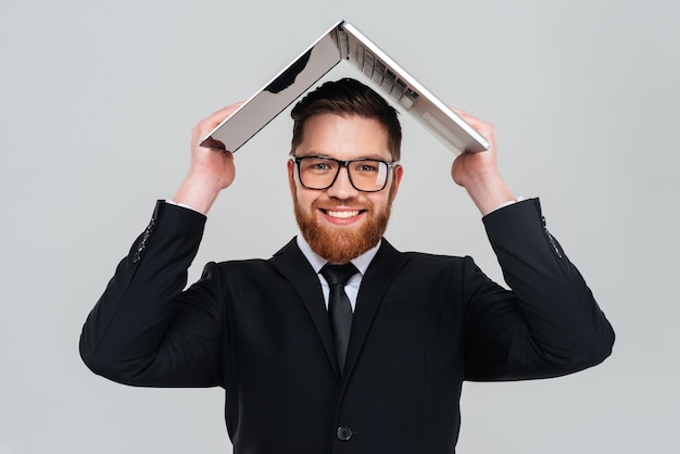 Premium Photo Smiling Bearded Business Man In Glasses And Suit