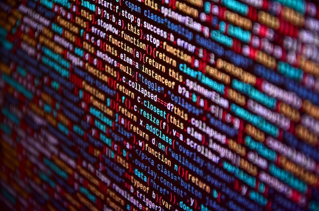 Premium Photo | Software developer programming code on computer ...