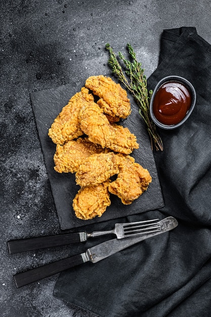 Premium Photo | Spicy deep fried breaded chicken wings Premium Photo | Spicy deep fried breaded chicken wings