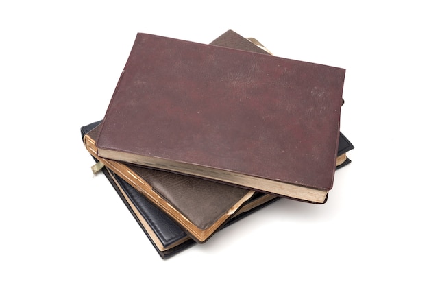 Premium Photo | A stack of old books on a white background. Premium Photo | A stack of old books on a white background.