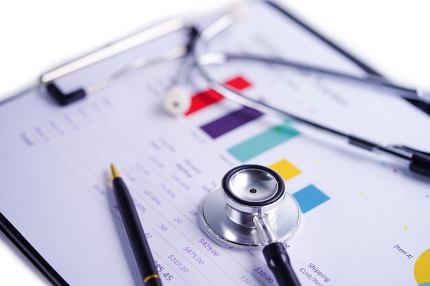 Premium Photo | Stethoscope on charts and graphs spreadsheet paper. Premium Photo | Stethoscope on charts and graphs spreadsheet paper.